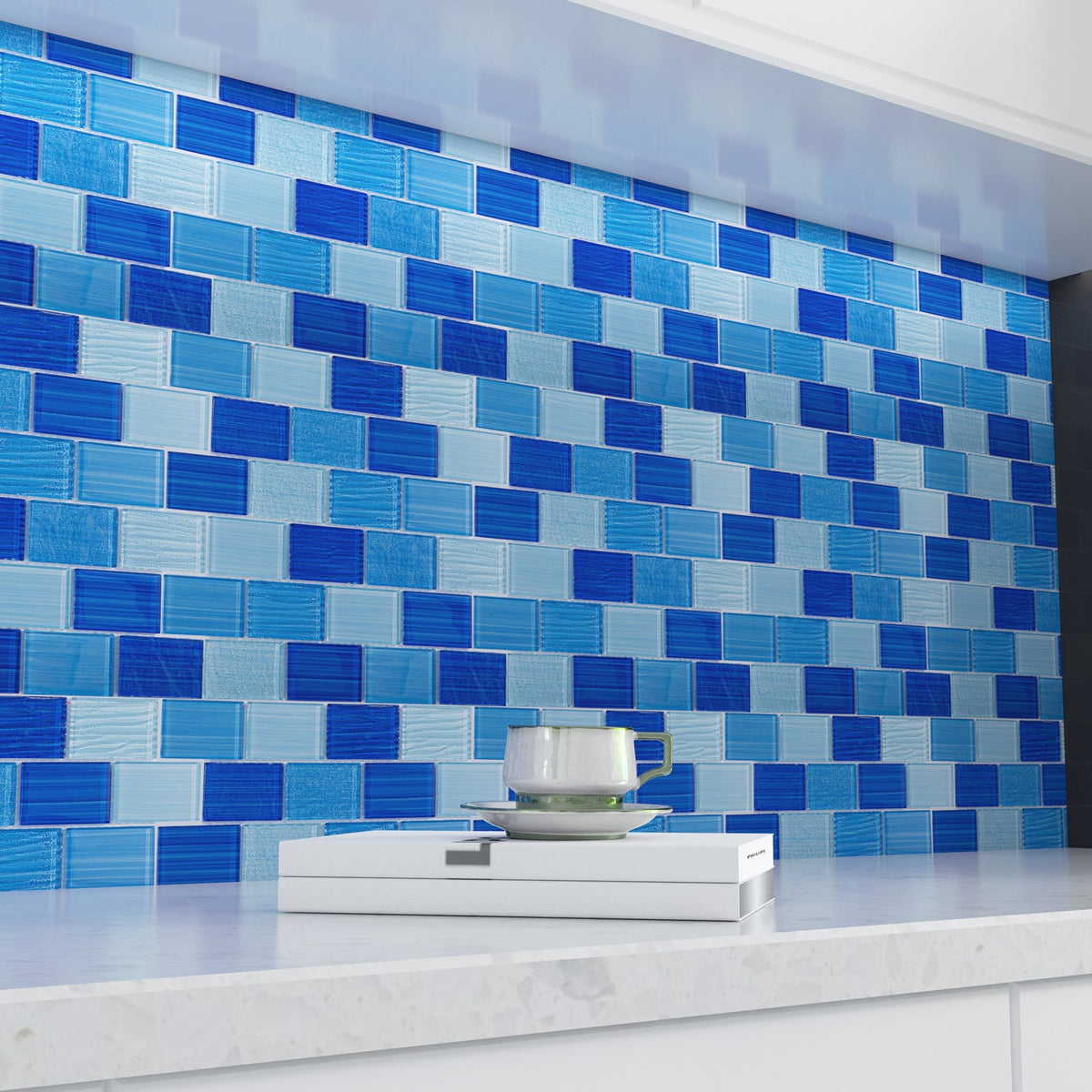 Add a splash of life to your kitchen walls with this blue mosaic glass ...